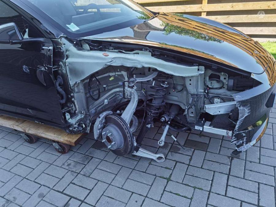 Black Tesla Model 3 2023 in Kaunas, with an engine capacity of 0.00 L and mileage of 61 thousand km for 17500 €, photo 12 on AUTOMOTO.COM.LV