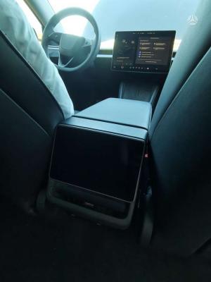 Black Tesla Model 3 2023 in Kaunas, with an engine capacity of 0.00 L and mileage of 61 thousand km for 17500 €, photo 21 on AUTOMOTO.COM.LV