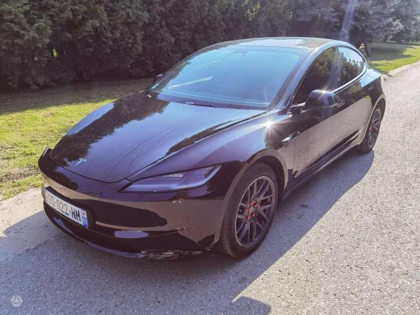 Black Tesla Model 3 2023 in Kaunas, with an engine capacity of 0.00 L and mileage of 62 thousand km for 17500 €, photo 2 on AUTOMOTO.COM.LV