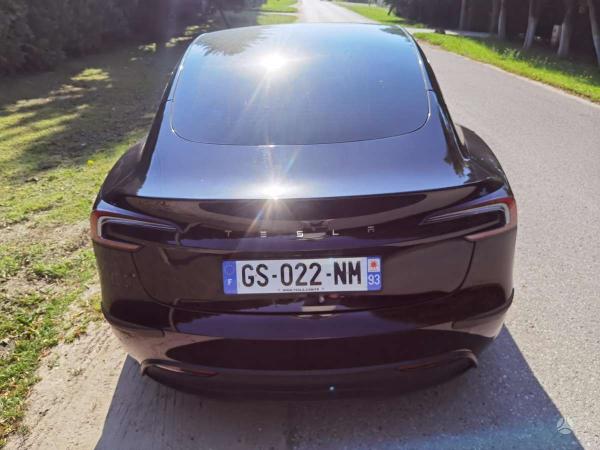 Black Tesla Model 3 2023 in Kaunas, with an engine capacity of 0.00 L and mileage of 62 thousand km for 17500 €, photo 10 on AUTOMOTO.COM.LV