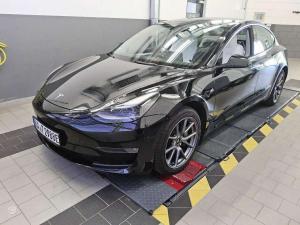 Black Tesla Model 3 2023 in Vilnius, with an engine capacity of 0.00 L and mileage of 145 thousand km for 29040 €, photo  on AUTOMOTO.COM.LV