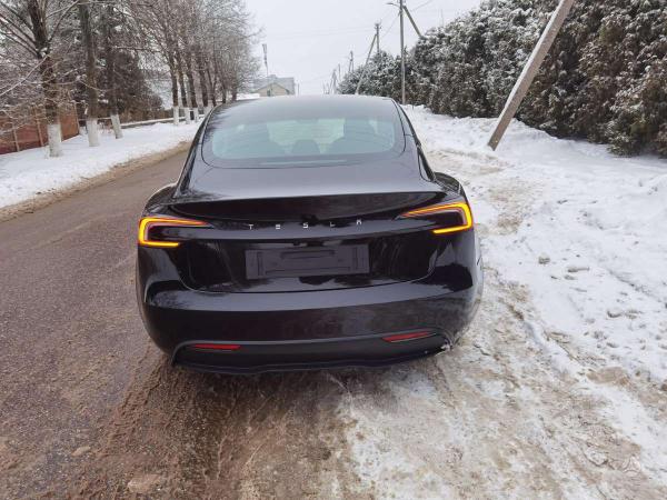 Black Tesla Model 3 2024 in Kaunas, with an engine capacity of 0.00 L and mileage of 16 thousand km for 18900 €, photo 4 on AUTOMOTO.COM.LV