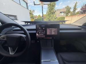 Black Tesla Model 3 2025 in Kaunas, with an engine capacity of 0.00 L and mileage of 28 thousand km for 28900 €, photo 8 on AUTOMOTO.COM.LV