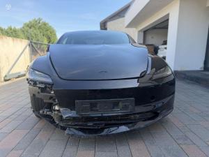 Black Tesla Model 3 2025 in Kaunas, with an engine capacity of 0.00 L and mileage of 28 thousand km for 28900 €, photo 14 on AUTOMOTO.COM.LV