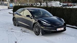 Black Tesla Model 3 2019 in Riga, with an engine capacity of 0.00 L and mileage of 169 thousand km for 19450 €, photo  on AUTOMOTO.COM.LV