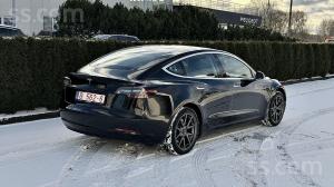 Black Tesla Model 3 2019 in Riga, with an engine capacity of 0.00 L and mileage of 169 thousand km for 19450 €, photo 3 on AUTOMOTO.COM.LV