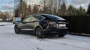 Black Tesla Model 3 2019 in Riga, with an engine capacity of 0.00 L and mileage of 169 thousand km for 19450 €, photo 4 on AUTOMOTO.COM.LV