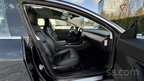 Black Tesla Model 3 2019 in Riga, with an engine capacity of 0.00 L and mileage of 169 thousand km for 19450 €, photo 10 on AUTOMOTO.COM.LV