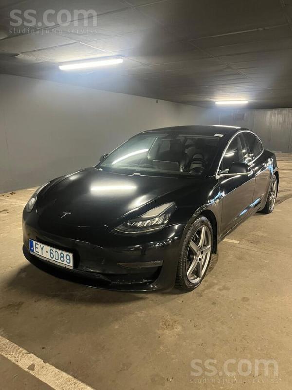 Black Tesla Model 3 2019 in Riga, with an engine capacity of 0.00 L and mileage of 184 thousand km for 20350 €, photo 1 on AUTOMOTO.COM.LV