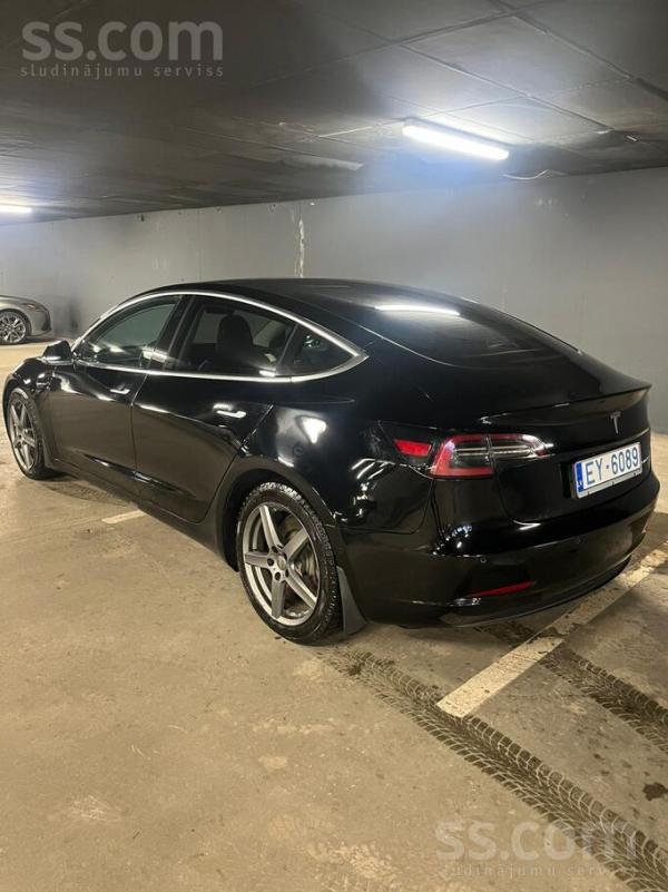 Black Tesla Model 3 2019 in Riga, with an engine capacity of 0.00 L and mileage of 184 thousand km for 20350 €, photo 2 on AUTOMOTO.COM.LV