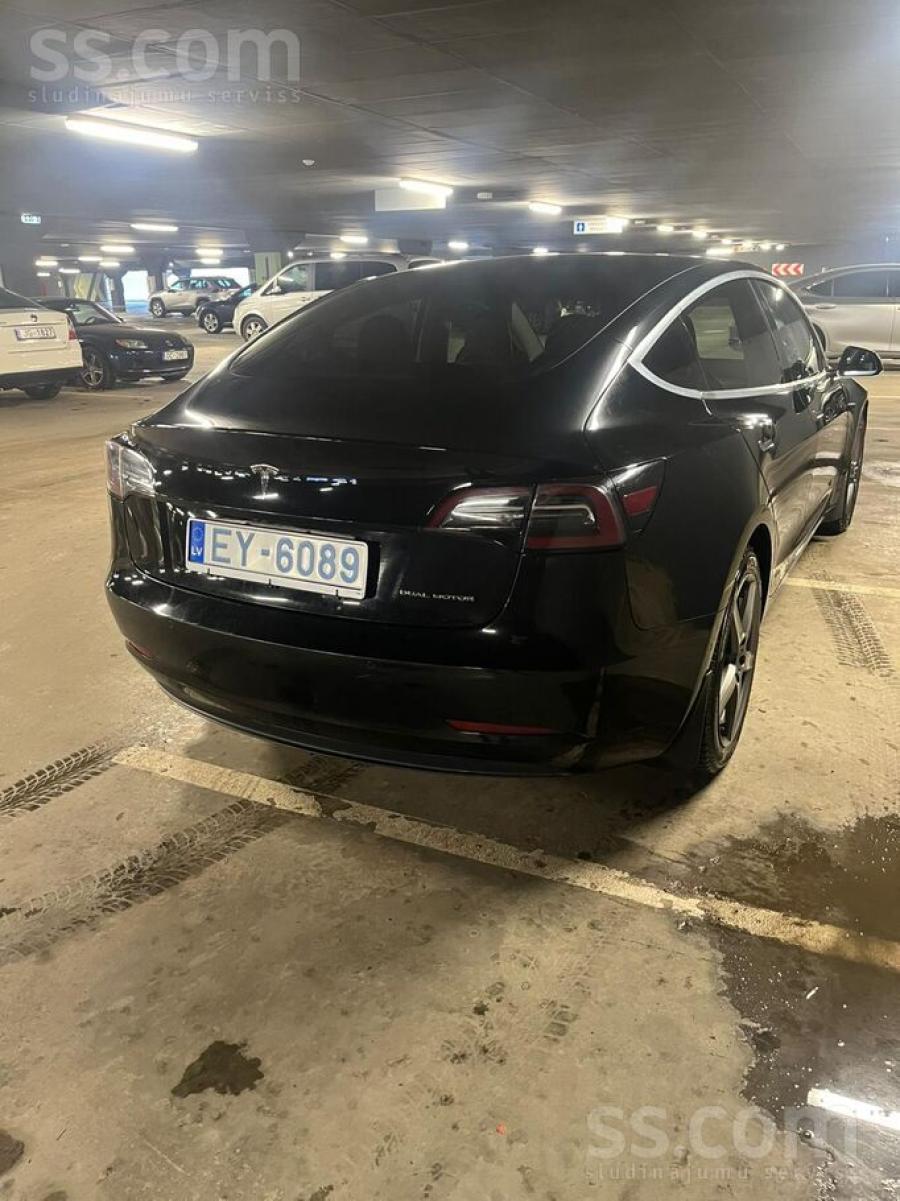 Black Tesla Model 3 2019 in Riga, with an engine capacity of 0.00 L and mileage of 184 thousand km for 20350 €, photo 3 on AUTOMOTO.COM.LV