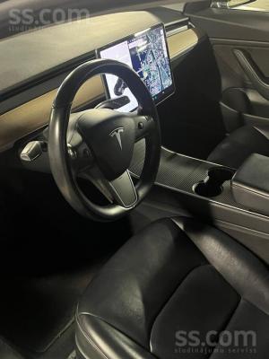 Black Tesla Model 3 2019 in Riga, with an engine capacity of 0.00 L and mileage of 184 thousand km for 20350 €, photo 6 on AUTOMOTO.COM.LV