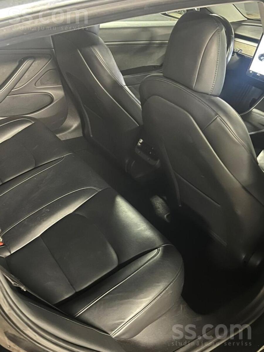 Black Tesla Model 3 2019 in Riga, with an engine capacity of 0.00 L and mileage of 184 thousand km for 20350 €, photo 8 on AUTOMOTO.COM.LV