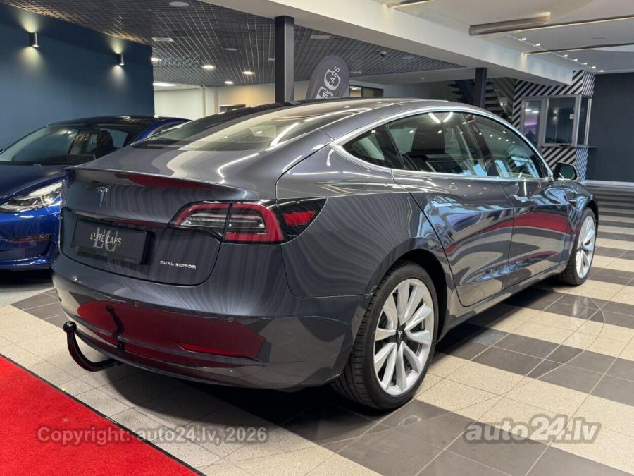 Black Tesla Model 3 2019 in Riga, with an engine capacity of 0.00 L and mileage of 145 thousand km for 19490 €, photo 5 on AUTOMOTO.COM.LV