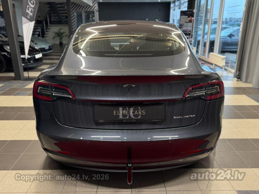 Black Tesla Model 3 2019 in Riga, with an engine capacity of 0.00 L and mileage of 145 thousand km for 19490 €, photo 6 on AUTOMOTO.COM.LV