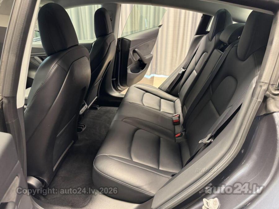 Black Tesla Model 3 2019 in Riga, with an engine capacity of 0.00 L and mileage of 145 thousand km for 19490 €, photo 19 on AUTOMOTO.COM.LV