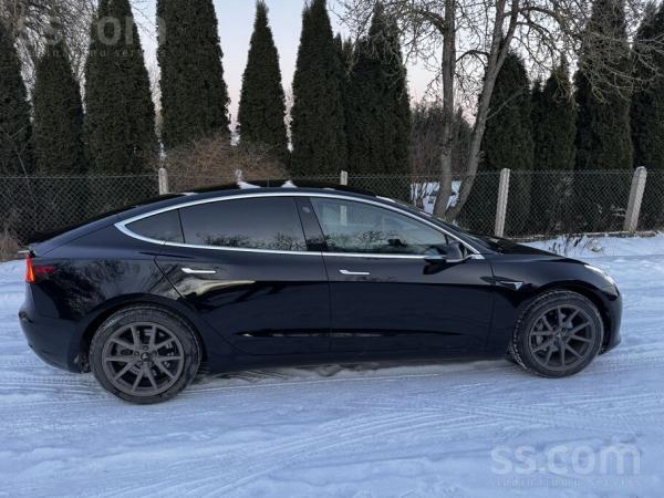 Black Tesla Model 3 2019 in Valmiera, with an engine capacity of 0.00 L and mileage of 153 thousand km for 19800 €, photo 3 on AUTOMOTO.COM.LV