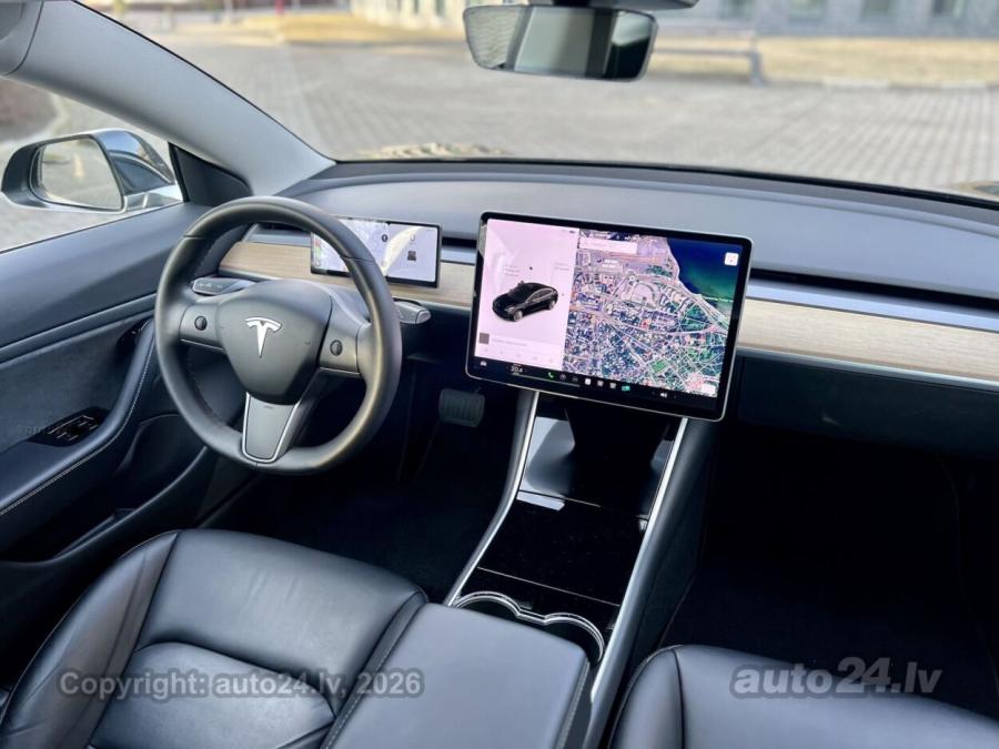 Black Tesla Model 3 2019 in Tallinn, with an engine capacity of 0.00 L and mileage of 106 thousand km for 23999 €, photo 14 on AUTOMOTO.COM.LV