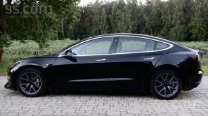 Black Tesla Model 3 2019 in Riga, with an engine capacity of 0.00 L and mileage of 187 thousand km for 17600 €, photo 3 on AUTOMOTO.COM.LV