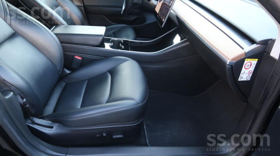 Black Tesla Model 3 2019 in Riga, with an engine capacity of 0.00 L and mileage of 187 thousand km for 17600 €, photo 9 on AUTOMOTO.COM.LV
