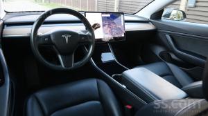Black Tesla Model 3 2019 in Riga, with an engine capacity of 0.00 L and mileage of 187 thousand km for 17600 €, photo 10 on AUTOMOTO.COM.LV