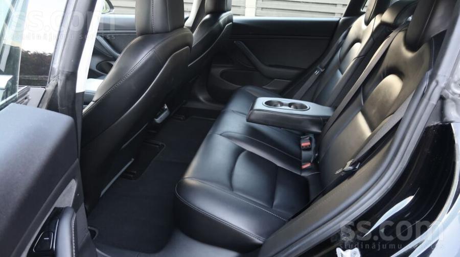 Black Tesla Model 3 2019 in Riga, with an engine capacity of 0.00 L and mileage of 187 thousand km for 17600 €, photo 12 on AUTOMOTO.COM.LV