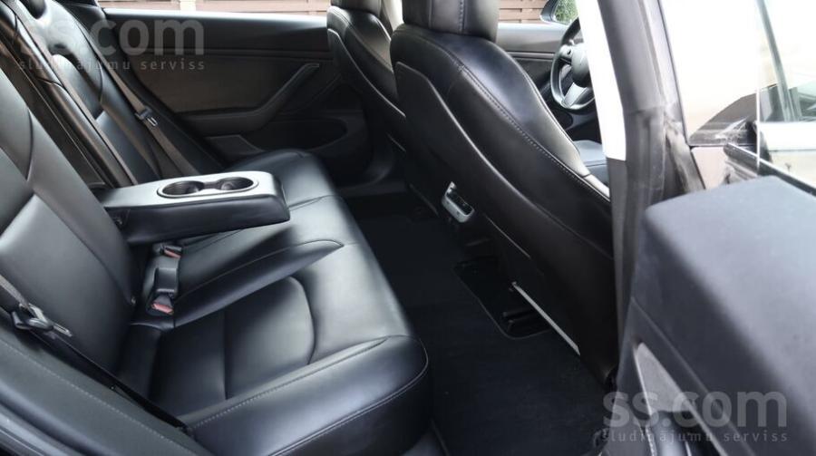 Black Tesla Model 3 2019 in Riga, with an engine capacity of 0.00 L and mileage of 187 thousand km for 17600 €, photo 13 on AUTOMOTO.COM.LV