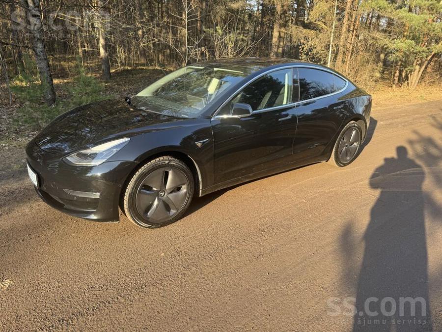 Black Tesla Model 3 2019 in Riga, with an engine capacity of 0.00 L and mileage of 94 thousand km for 19000 €, photo 3 on AUTOMOTO.COM.LV