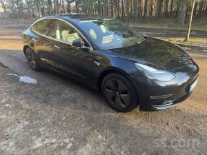 Black Tesla Model 3 2019 in Riga, with an engine capacity of 0.00 L and mileage of 94 thousand km for 19000 €, photo 4 on AUTOMOTO.COM.LV