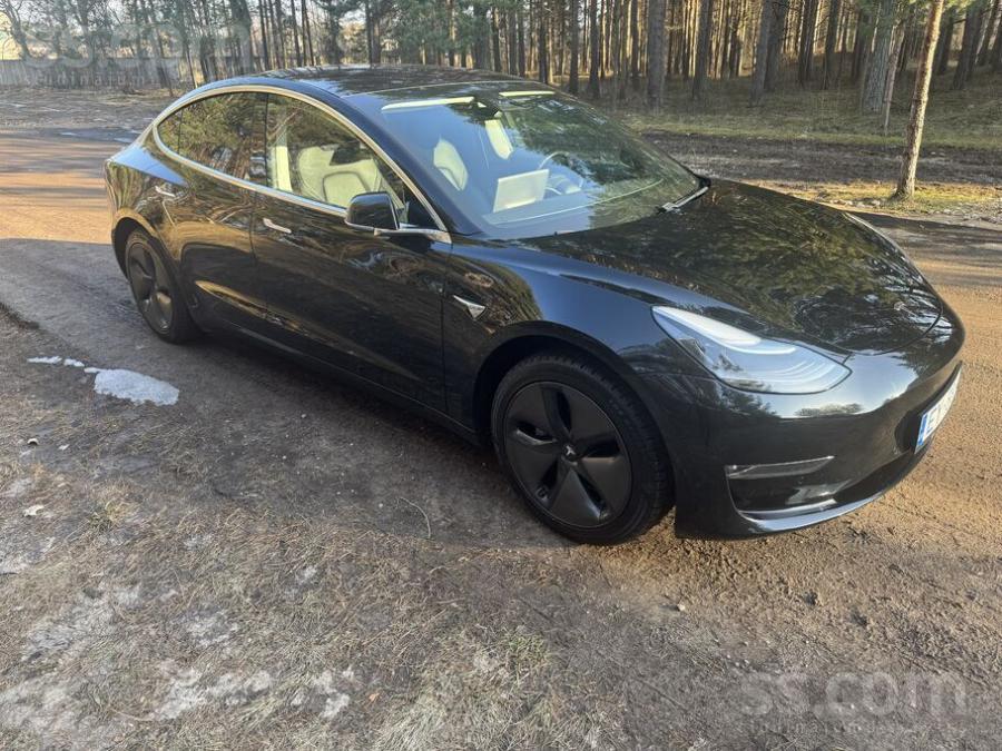 Black Tesla Model 3 2019 in Riga, with an engine capacity of 0.00 L and mileage of 94 thousand km for 19000 €, photo 4 on AUTOMOTO.COM.LV