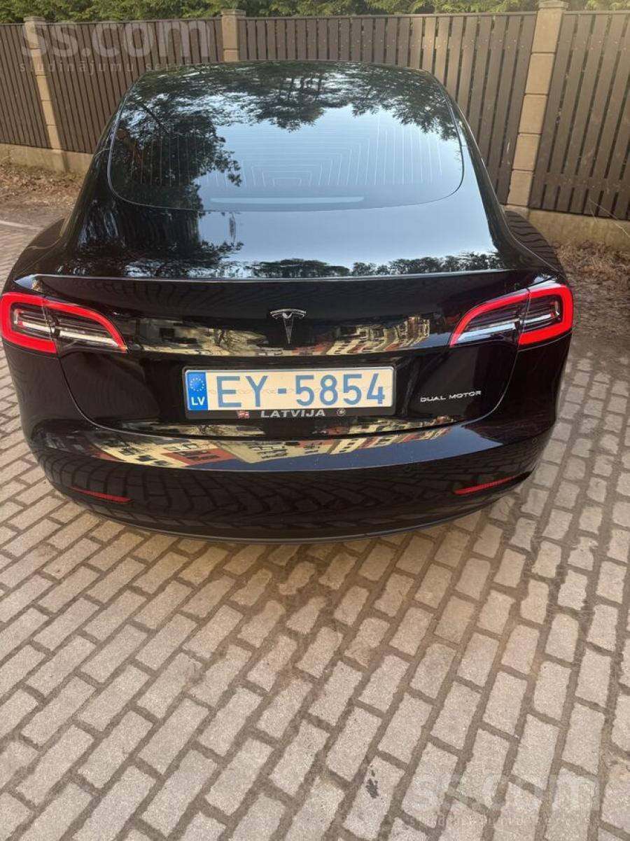 Black Tesla Model 3 2019 in Riga, with an engine capacity of 0.00 L and mileage of 94 thousand km for 19000 €, photo 5 on AUTOMOTO.COM.LV