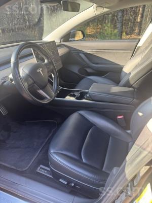 Black Tesla Model 3 2019 in Riga, with an engine capacity of 0.00 L and mileage of 94 thousand km for 19000 €, photo 6 on AUTOMOTO.COM.LV