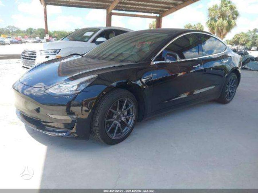 Black Tesla Model 3 2019 in Klaipeda, with an engine capacity of 0.00 L and mileage of 68 thousand km for 9500 €, photo 4 on AUTOMOTO.COM.LV