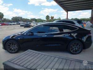 Black Tesla Model 3 2019 in Klaipeda, with an engine capacity of 0.00 L and mileage of 68 thousand km for 9500 €, photo 11 on AUTOMOTO.COM.LV