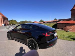 Black Tesla Model 3 2019 in Kaunas, with an engine capacity of 0.00 L and mileage of 159 thousand km for 19400 €, photo 4 on AUTOMOTO.COM.LV