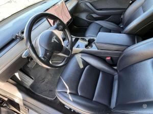 Black Tesla Model 3 2019 in Kaunas, with an engine capacity of 0.00 L and mileage of 159 thousand km for 19400 €, photo 13 on AUTOMOTO.COM.LV