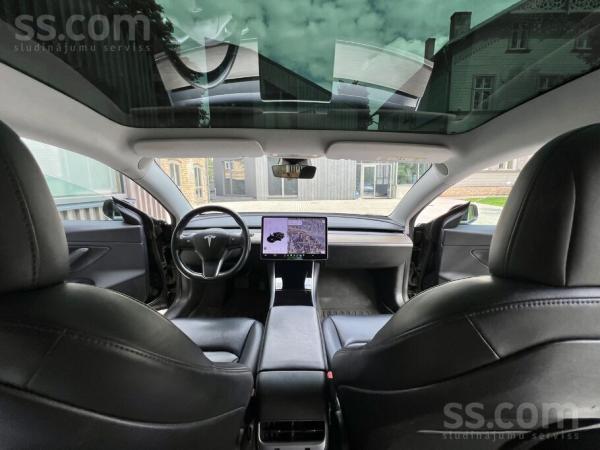 Black Tesla Model 3 2019 in Riga, with an engine capacity of 0.00 L and mileage of 225 thousand km for 15200 €, photo 11 on AUTOMOTO.COM.LV