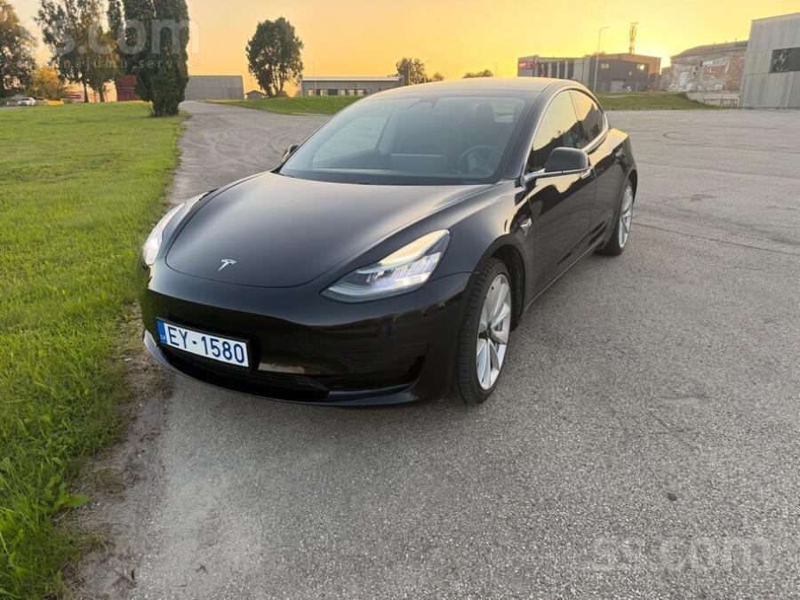 Black Tesla Model 3 2019 in Riga, with an engine capacity of 0.00 L and mileage of 128 thousand km for 17100 €, photo 3 on AUTOMOTO.COM.LV