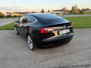 Black Tesla Model 3 2019 in Riga, with an engine capacity of 0.00 L and mileage of 128 thousand km for 17100 €, photo 5 on AUTOMOTO.COM.LV