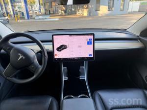 Black Tesla Model 3 2019 in Riga, with an engine capacity of 0.00 L and mileage of 128 thousand km for 17100 €, photo 7 on AUTOMOTO.COM.LV
