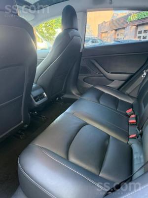 Black Tesla Model 3 2019 in Riga, with an engine capacity of 0.00 L and mileage of 128 thousand km for 17100 €, photo 8 on AUTOMOTO.COM.LV