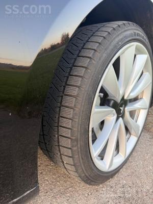 Black Tesla Model 3 2019 in Riga, with an engine capacity of 0.00 L and mileage of 128 thousand km for 17100 €, photo 10 on AUTOMOTO.COM.LV