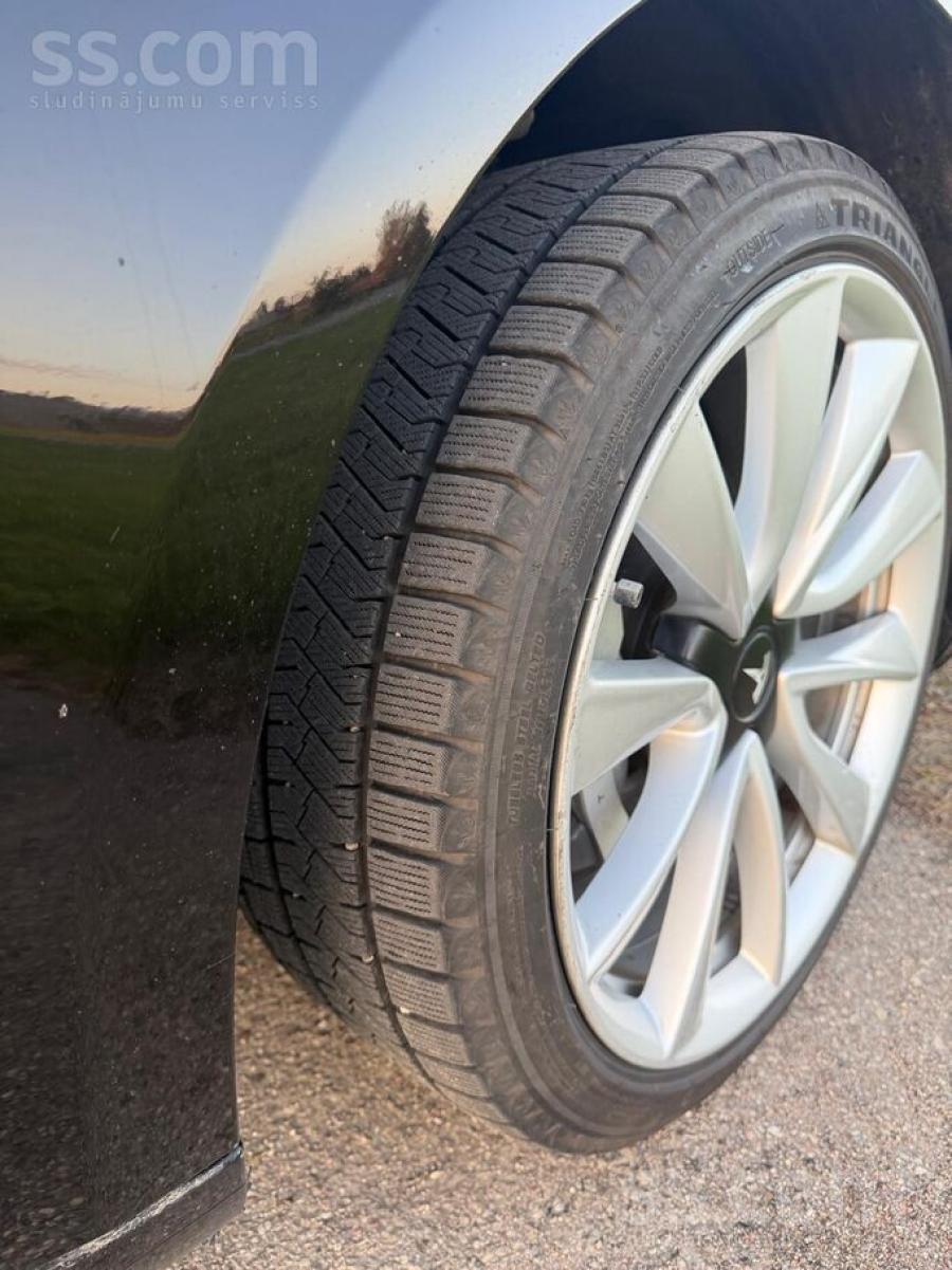 Black Tesla Model 3 2019 in Riga, with an engine capacity of 0.00 L and mileage of 128 thousand km for 17100 €, photo 10 on AUTOMOTO.COM.LV