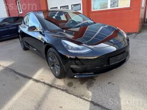 Black Tesla Model 3 2020 in Riga, with an engine capacity of 0.00 L and mileage of 104 thousand km for 22800 €, photo 3 on AUTOMOTO.COM.LV
