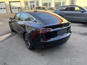 Black Tesla Model 3 2020 in Riga, with an engine capacity of 0.00 L and mileage of 104 thousand km for 22800 €, photo 5 on AUTOMOTO.COM.LV