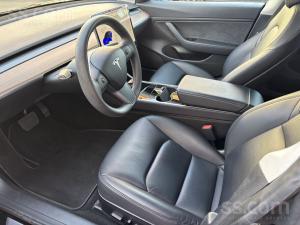 Black Tesla Model 3 2020 in Riga, with an engine capacity of 0.00 L and mileage of 104 thousand km for 22800 €, photo 6 on AUTOMOTO.COM.LV