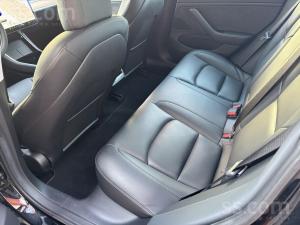 Black Tesla Model 3 2020 in Riga, with an engine capacity of 0.00 L and mileage of 104 thousand km for 22800 €, photo 7 on AUTOMOTO.COM.LV