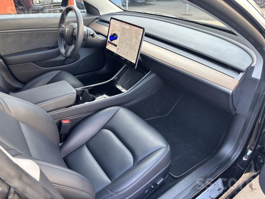 Black Tesla Model 3 2020 in Riga, with an engine capacity of 0.00 L and mileage of 104 thousand km for 22800 €, photo 8 on AUTOMOTO.COM.LV