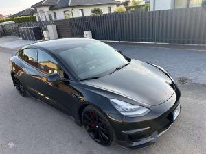 Black Tesla Model 3 2020 in Siauliai, with an engine capacity of 0.00 L and mileage of 66 thousand km for 24500 €, photo  on AUTOMOTO.COM.LV
