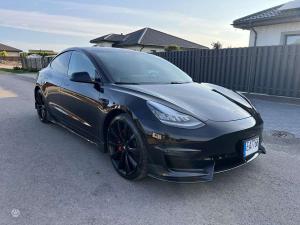 Black Tesla Model 3 2020 in Siauliai, with an engine capacity of 0.00 L and mileage of 66 thousand km for 24500 €, photo 4 on AUTOMOTO.COM.LV